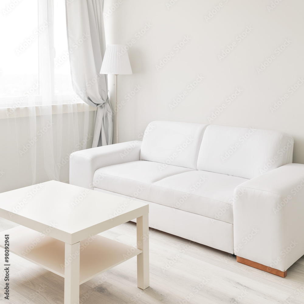Small table and sofa Stock Photo | Adobe Stock
