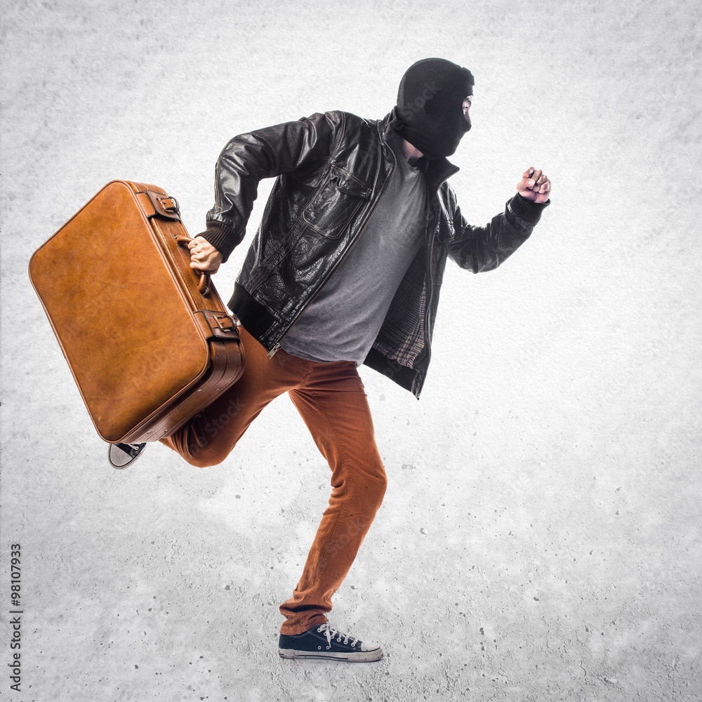 Robber running fast 스톡 사진 | Adobe Stock