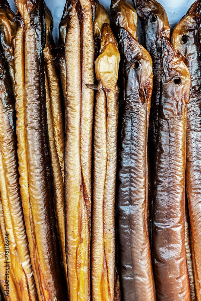 Poster Fresh smoked eels / Fresh smoked eels ready to eat a traditional ...