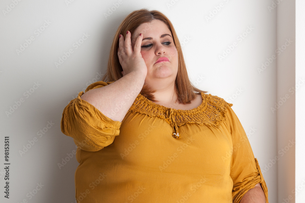 Worried overweight woman portrait Stock-Foto | Adobe Stock