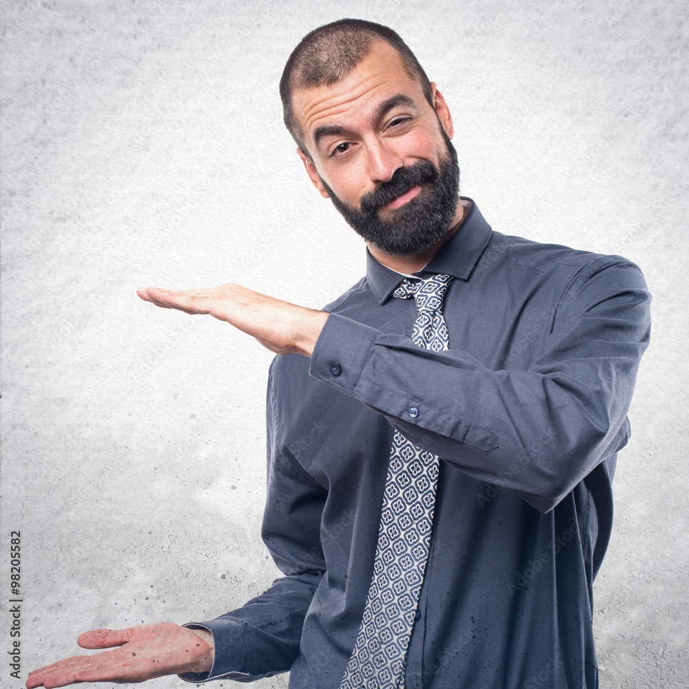 Man holding something Stock Photo | Adobe Stock