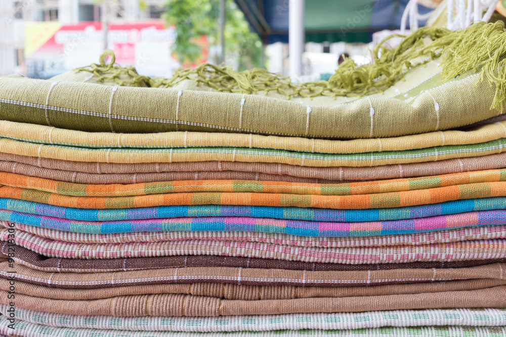 heap of cloth fabric in retail shop foto de Stock | Adobe Stock