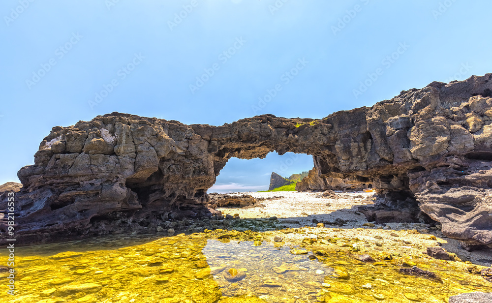Beauty of volcanic stone gate with natural erosion shaped giant stone ...