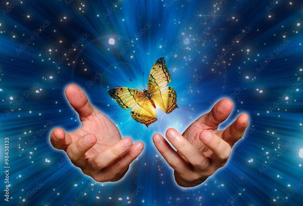 open hands in gesture of accepting or giving and divine light with a ...