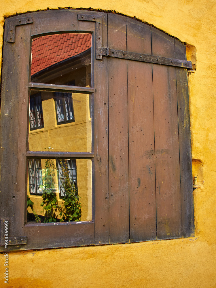 Rustic window with wooden exterior shutters Stock Photo | Adobe Stock