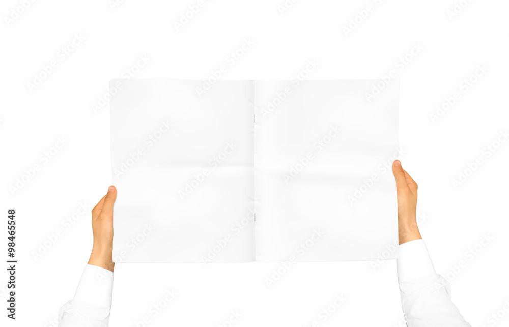 Hand in white shirt sleeve holding blank journal in the hand. Empty ...