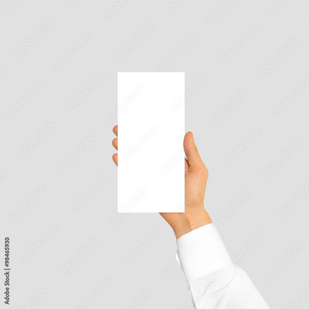 Hand holding blank flyer brochure booklet in the hand. Leaflet ...