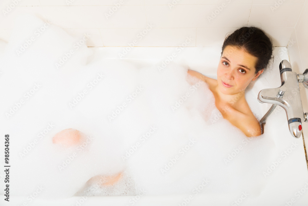 young girl covered foam in bath Stock Photo | Adobe Stock