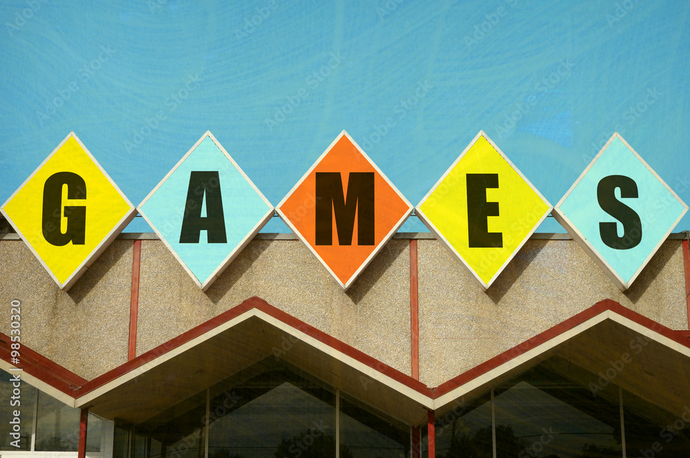 aged and worn vintage photo of retro games sign Stock Photo | Adobe Stock
