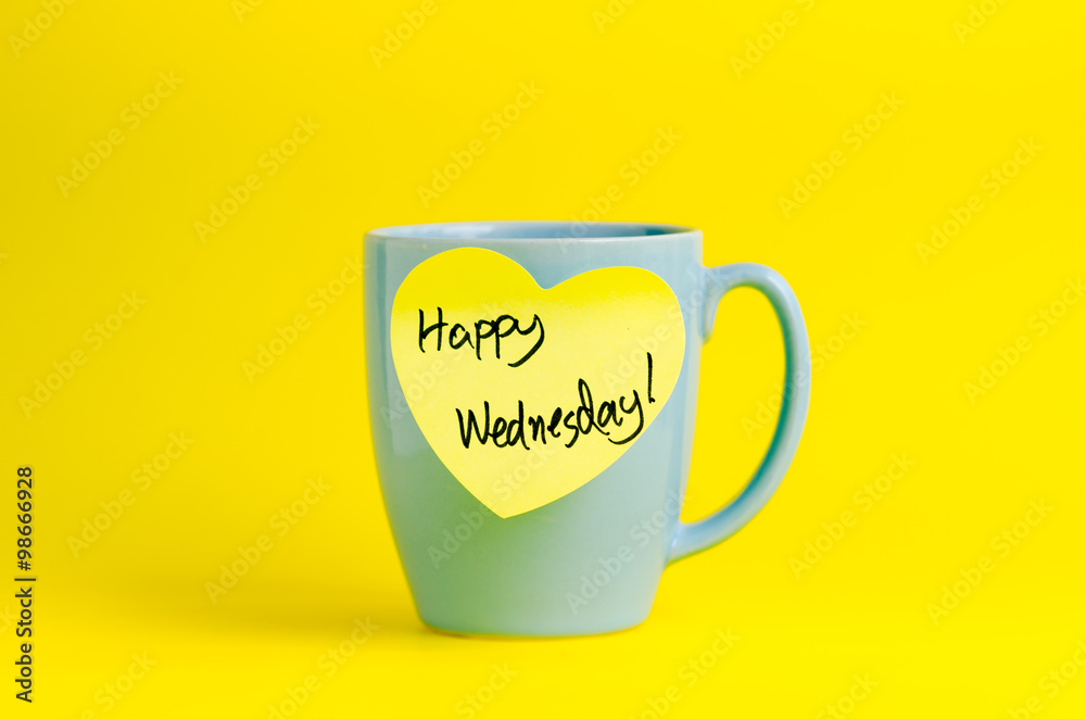 Happy Wednesday message on blue pastel mug. Stock Photo | Adobe Stock