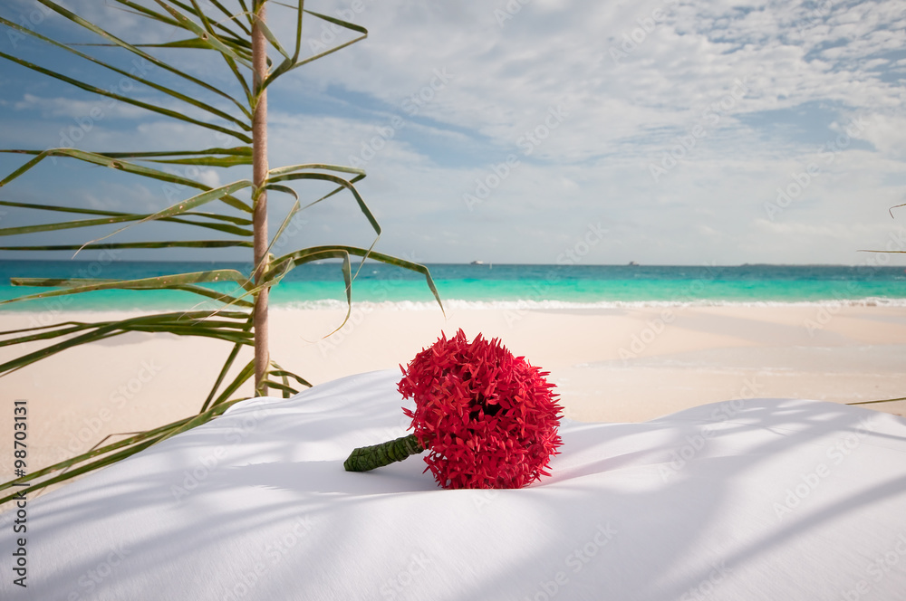 Tropical Flowers On Beach
