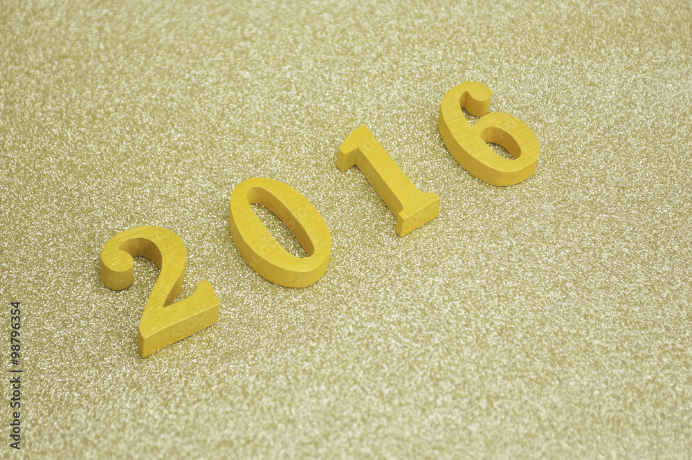 Golden wooden number 2016 over gold background, New year concep Stock ...