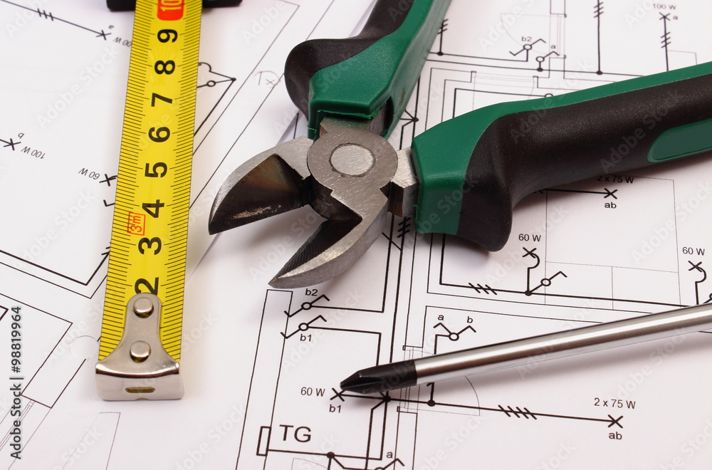 Work tools on electrical construction drawing of house Stock Photo ...