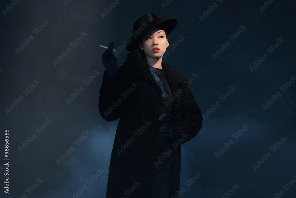 Retro 1940 asian fashion woman. Smoking cigarette. Wearing hat. Stock ...