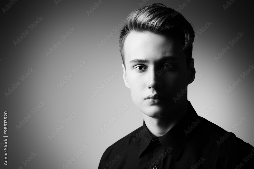 imposing young man Stock Photo | Adobe Stock