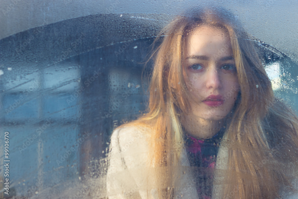 sad beautiful seksalnaya Pretty sad lonely girl behind wet glass with ...