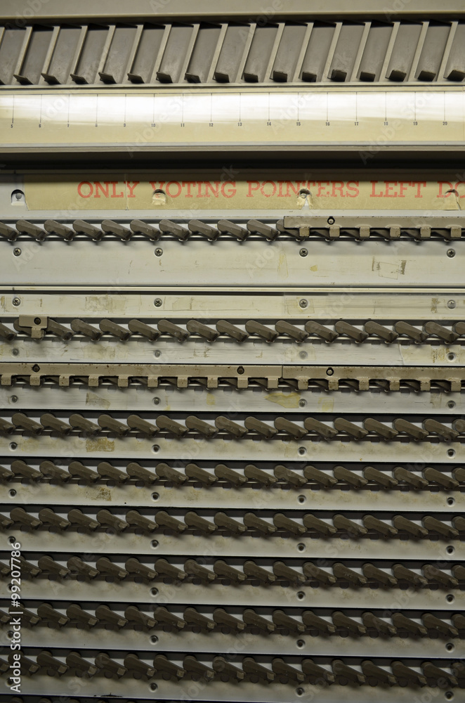 Rows of levers on a voting machine Stock Photo | Adobe Stock
