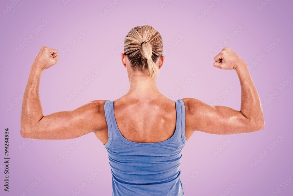 Foto Stock Composite image of rear view of woman flexing muscles ...