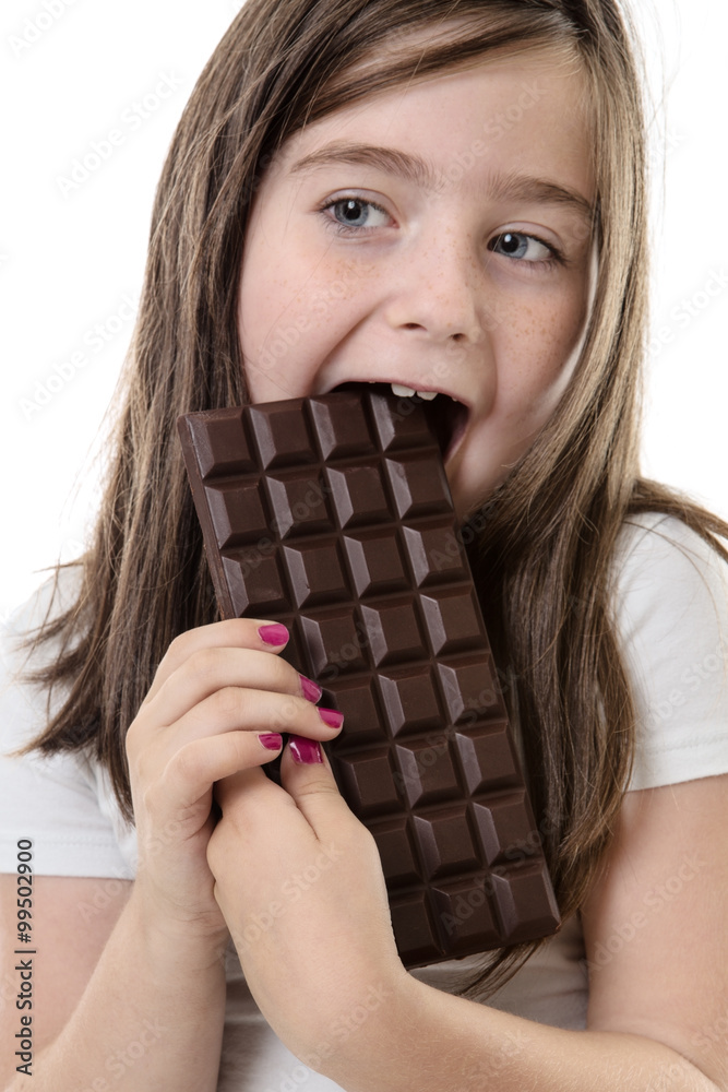 little girl eating chocolate Stock Photo | Adobe Stock