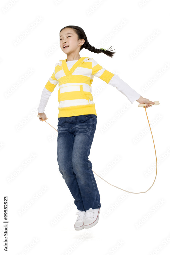 Young girl jumping rope Stock Photo | Adobe Stock
