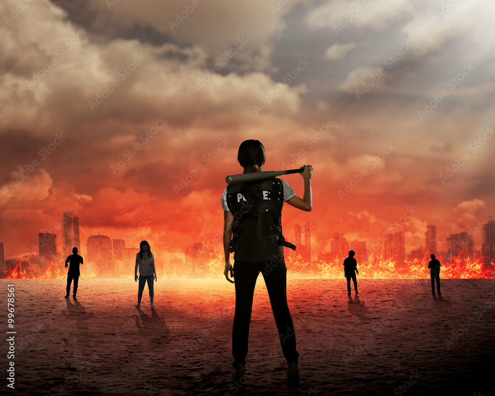 Back view of police woman ready to fight zombie Stock Photo | Adobe Stock