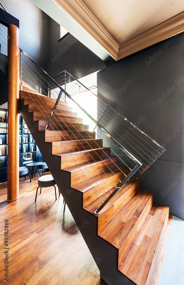 Beautiful modern loft, staircase top view Stock Photo | Adobe Stock