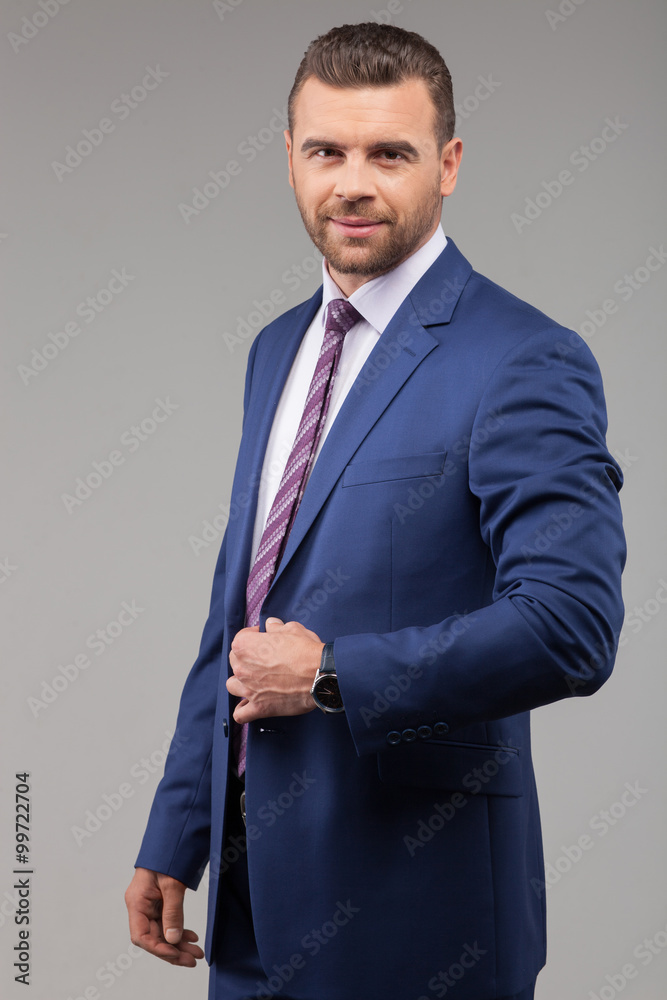 Attractive man in suit with cute smile Stock 写真 | Adobe Stock