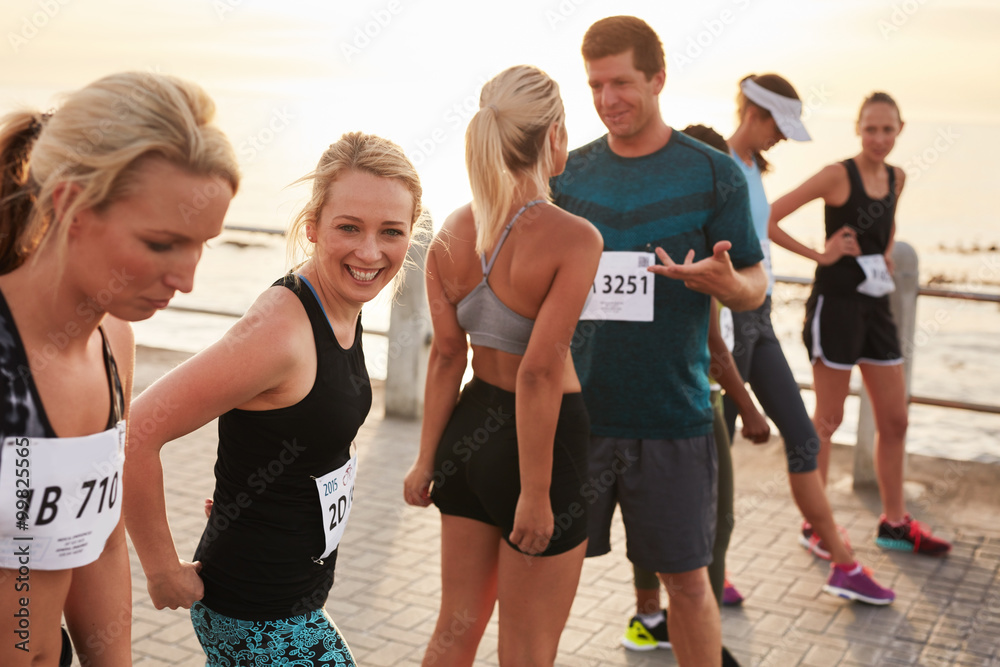 Fotografia do Stock: Athletes talking before starting the marathon race ...