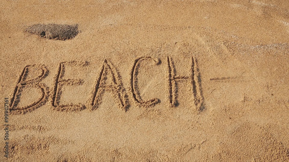 Word Beach appearing letter by letter followed by an arrow on a sandy ...