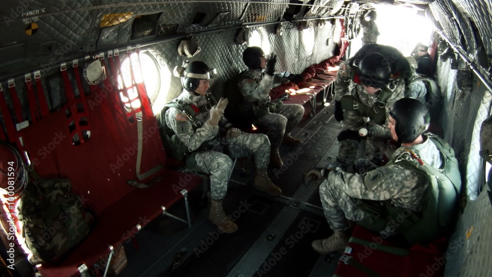 Footage from inside a CH-47 Chinook helicopter transporting ...