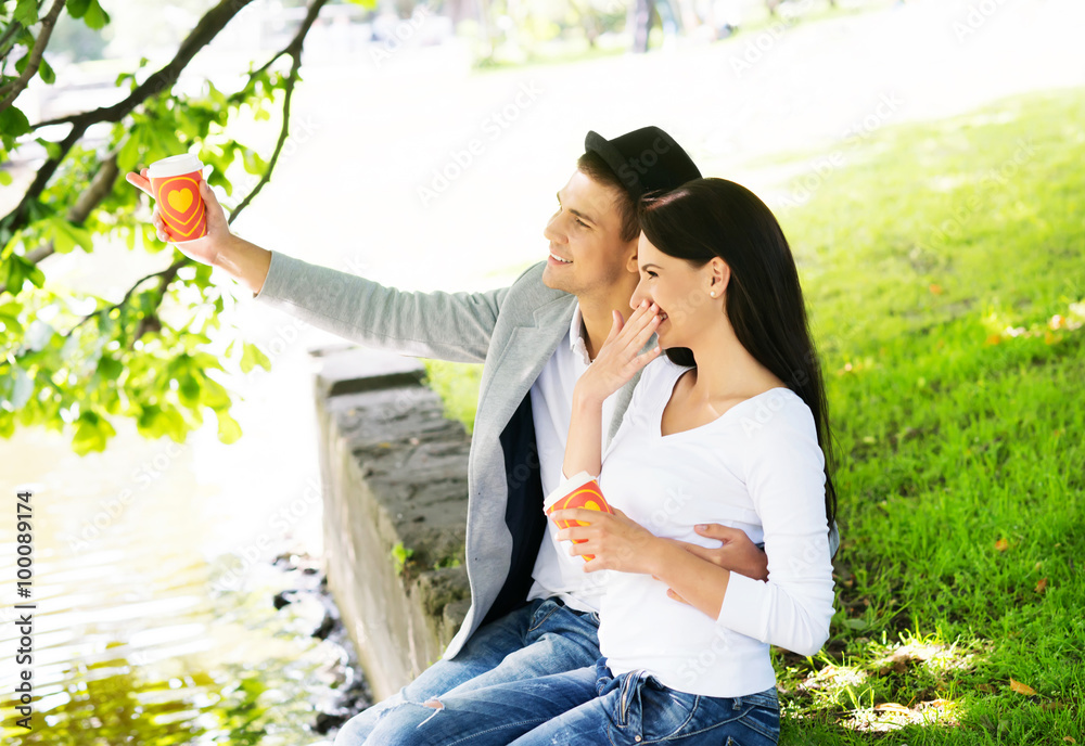 Lovely couple on a romantic date in a park Stock Photo | Adobe Stock