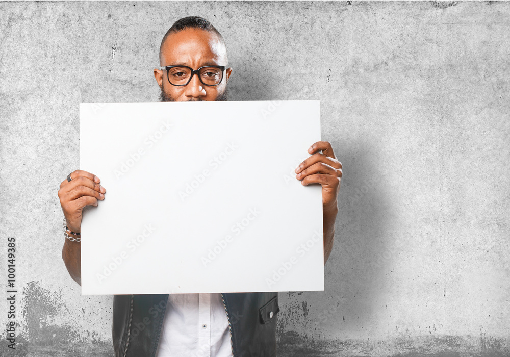 black man holding a banner Stock Photo | Adobe Stock