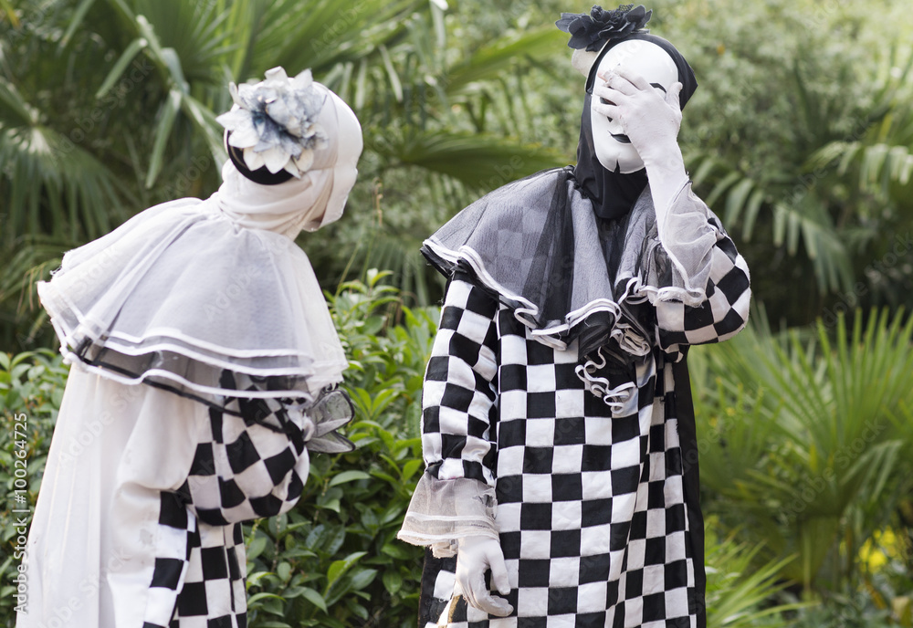 Carnival costume puppet character. Two men dressed in a suit with a ...