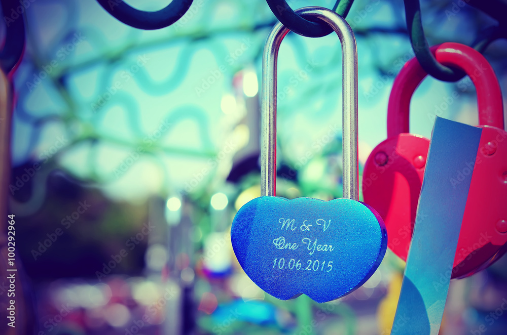 Beautiful multicolored wedding locks on the iron tree of love. Concept ...