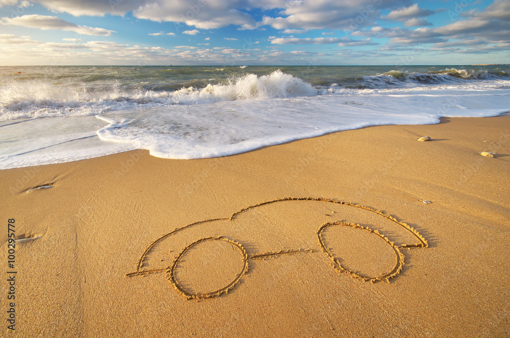 Draw car on beach sand. Stock Photo | Adobe Stock