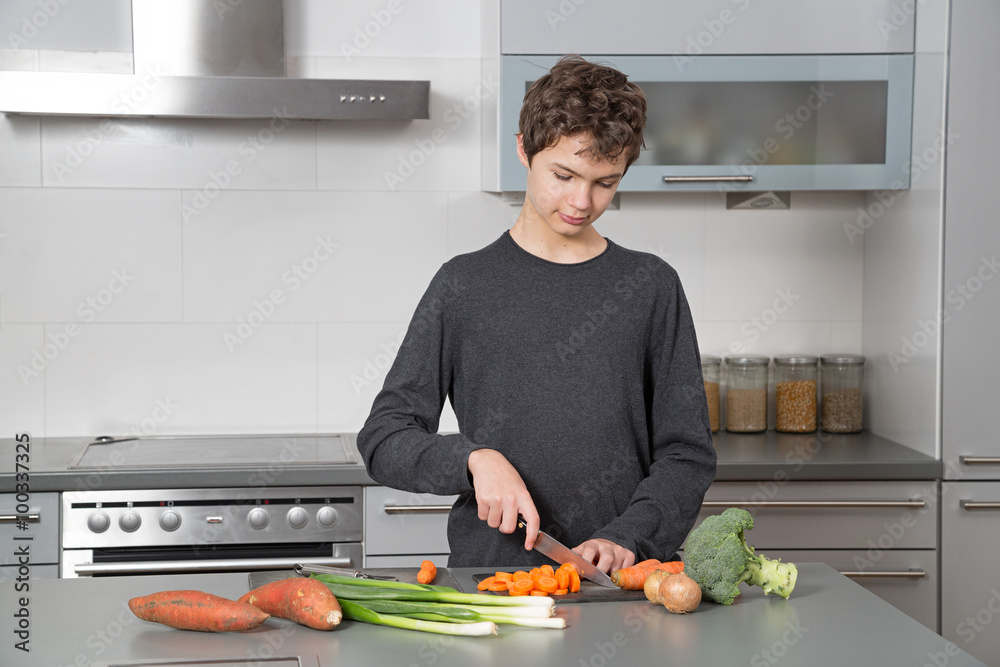 Teenage Boy in the kitchen Stock Photo | Adobe Stock
