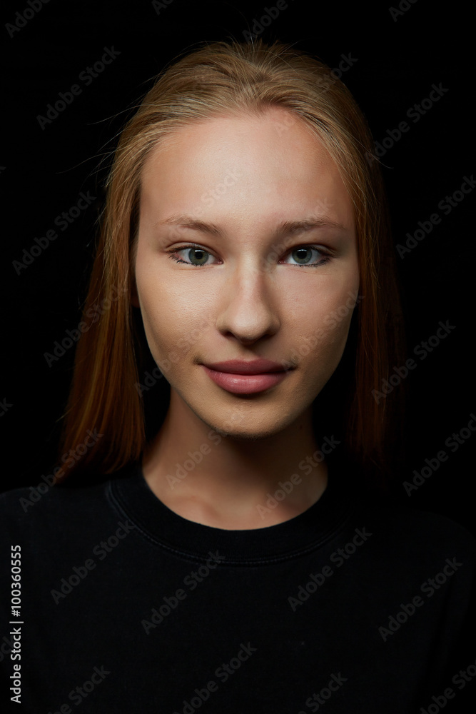 Front view of smiling young woman Stock Photo | Adobe Stock