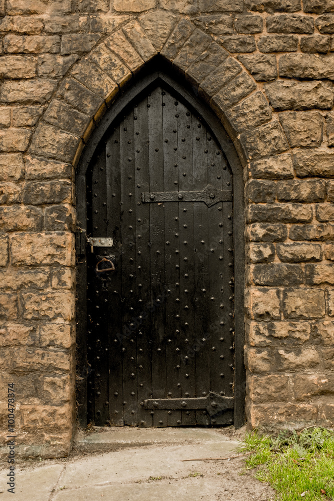 Black Medieval arched door way in the wall of Nottingham castle Stock ...