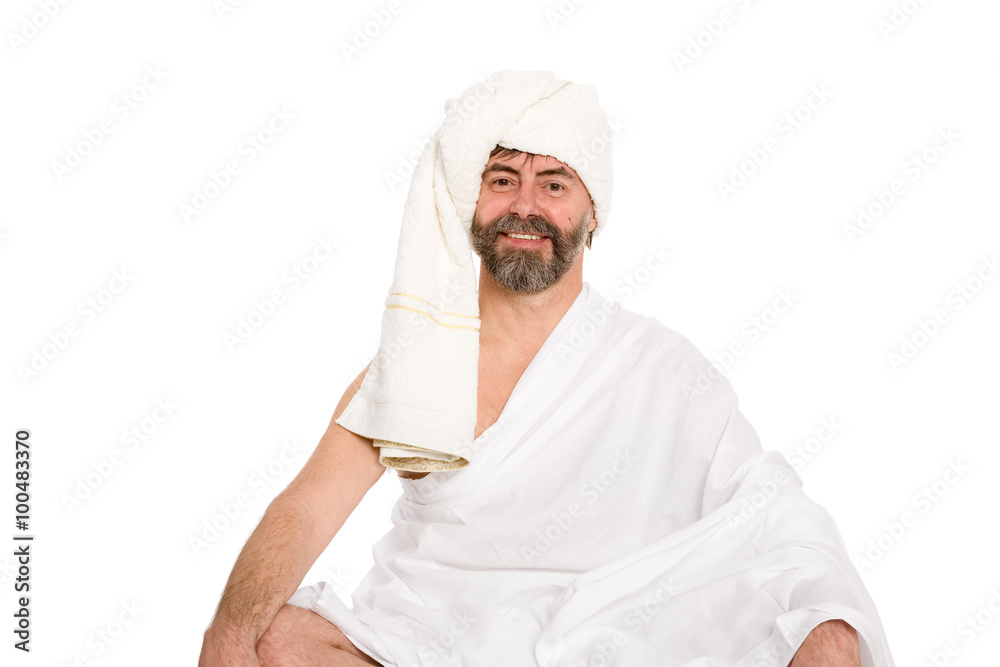 Joyful man dressed in the sauna in a turban. From a series of Russian ...