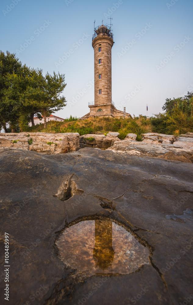 Savudrija Lighthouse on Rocky Coast Reflected in a Puddle, the Most ...