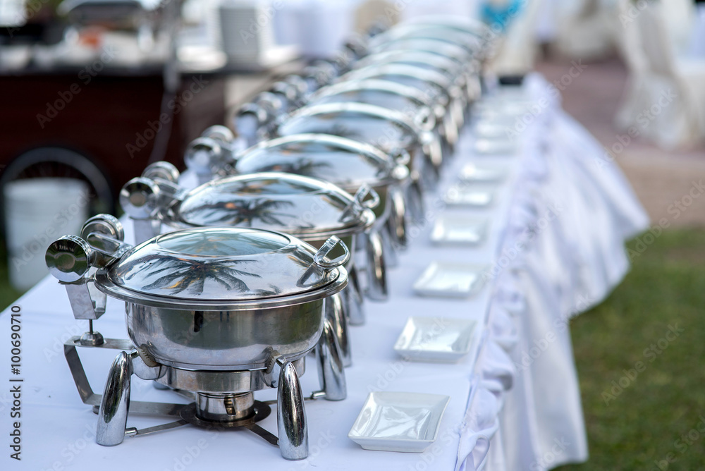 Buffet Table with Row of Food Service Steam Pans Stock Photo | Adobe Stock