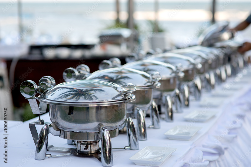 Buffet Table with Row of Food Service Steam Pans Stock Photo | Adobe Stock