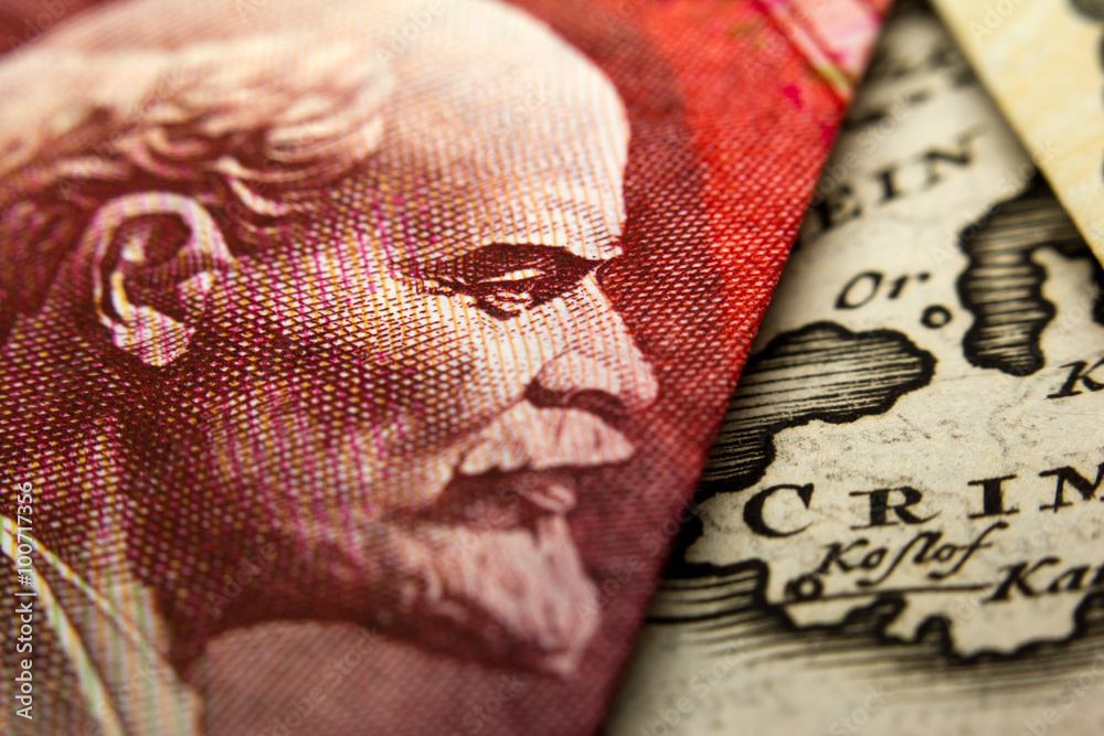 Fotografía Close-up of an Russian ruble banknote (figuring Lenin) and a ...