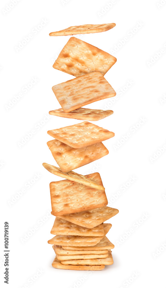 big stack of crackers falling from a height on an isolated white Stock ...
