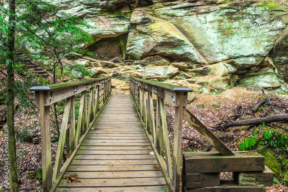 Hiking In Hocking Hills. Hikers footbridge at the Rock House scenic ...