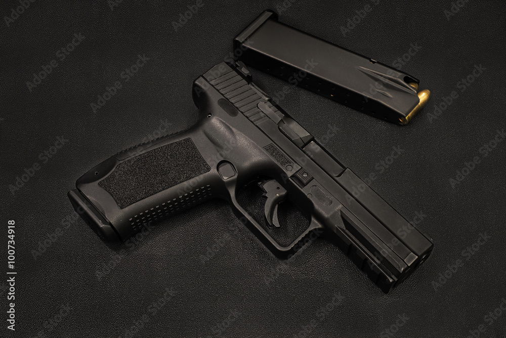 handgun on the black background Stock Photo | Adobe Stock