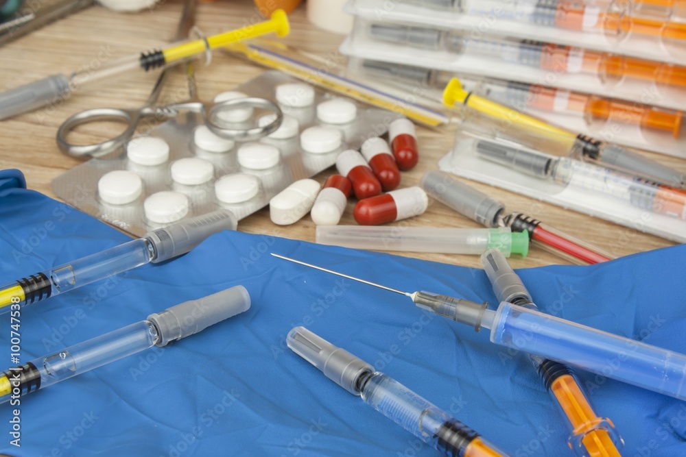 Flu epidemic. Vaccination against influenza epidemic. Syringe and ...