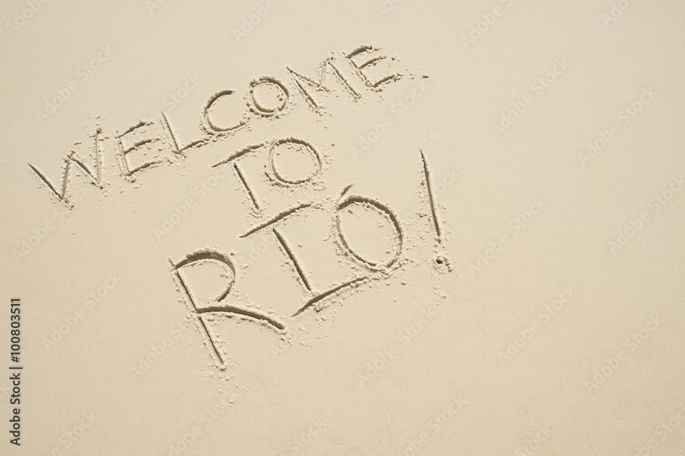 Welcome to Rio (as in, de Janeiro) message handwritten in smooth sand ...