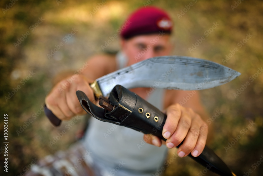 Holding An Old Dagger