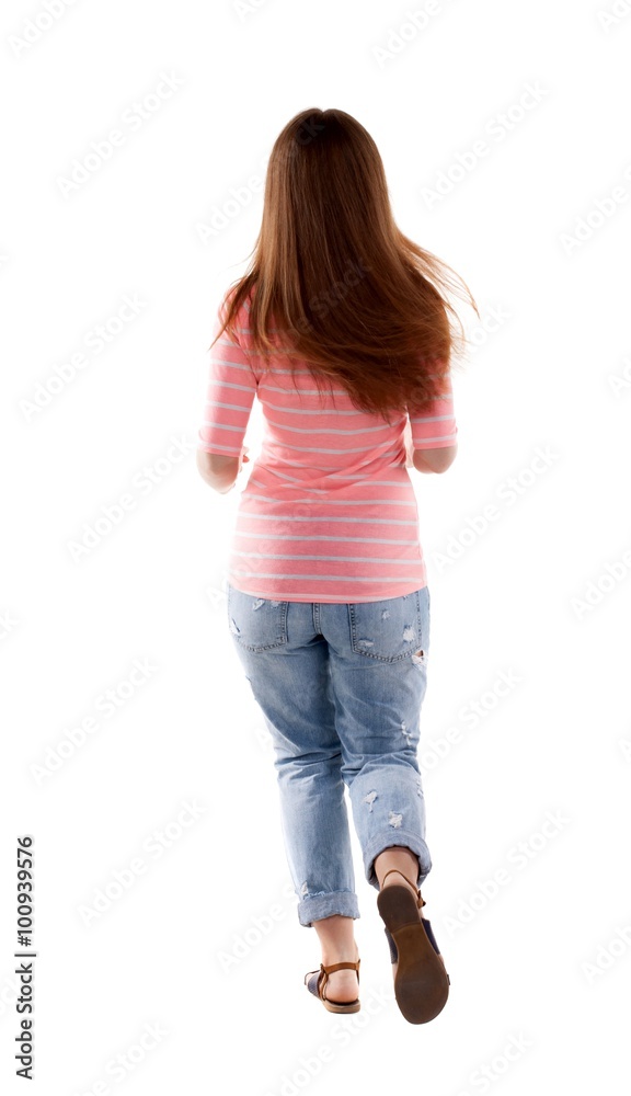 back view of running woman. beautiful redhead girl in motion. Stock ...